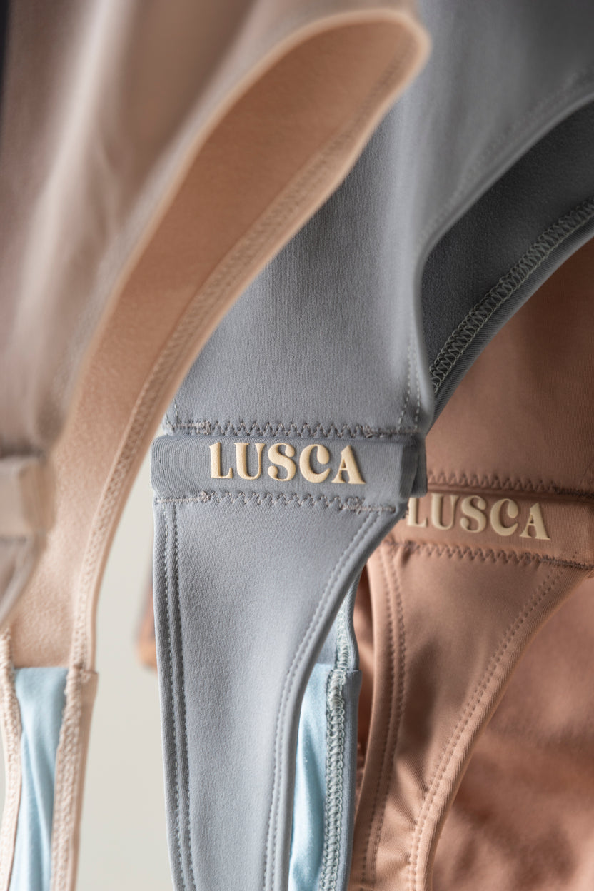 LUSCA | Bodysuits with a Magnetic Closure